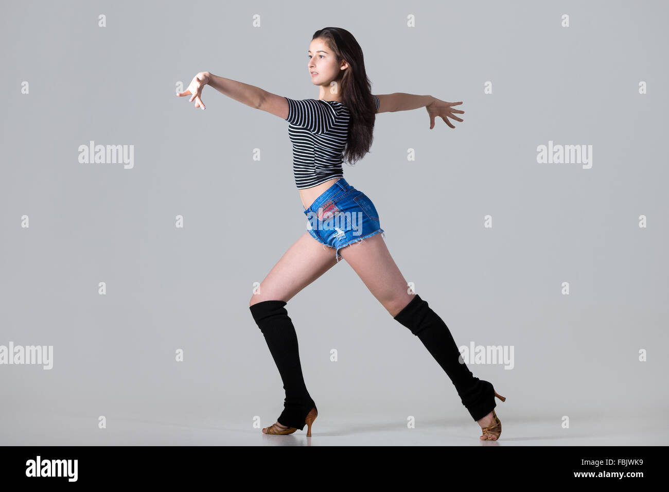Beautiful young cool fit modern latino dancer performer working out ...
