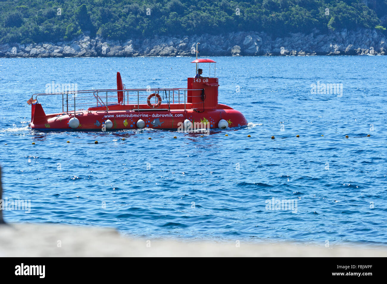 A red submarine leaving the Dubrovnik harbour, Croatia Stock Photo - Alamy