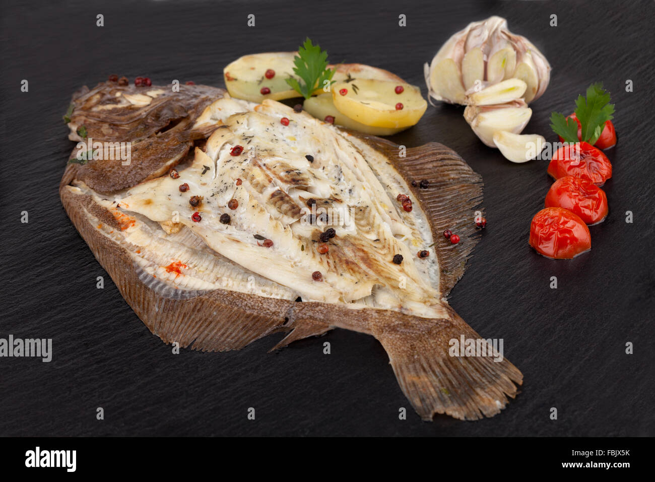 Plate Of Baked Turbot Fish Stock Photo - Alamy