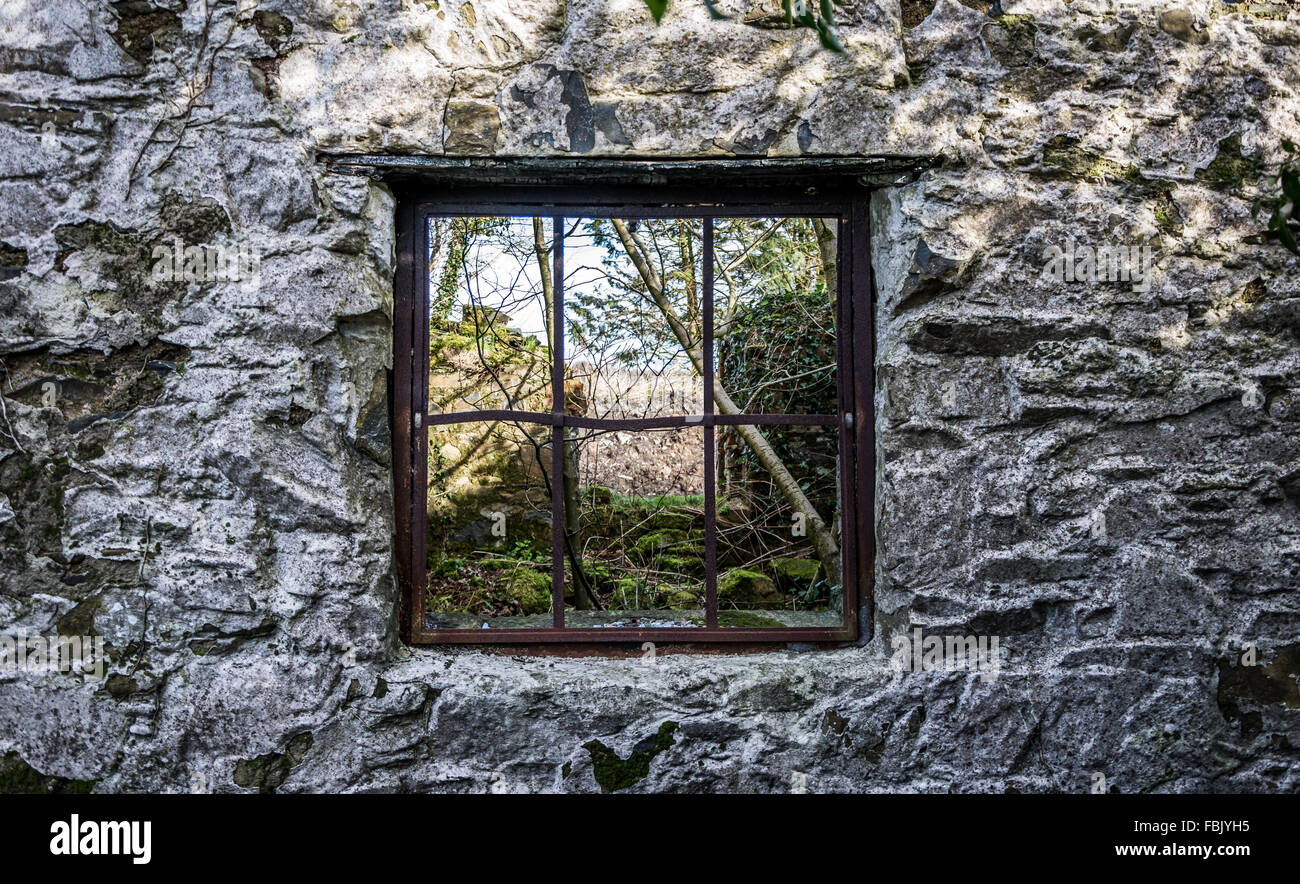 An old window frame on an abandoned Irish cottage laying in ruins Stock ...