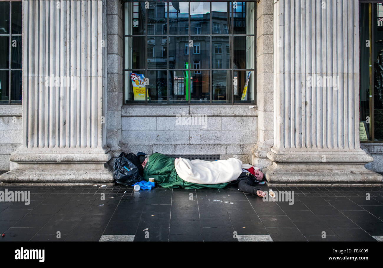 Two homeless men lay outside the General Post Office GPO on Dublin's O ...