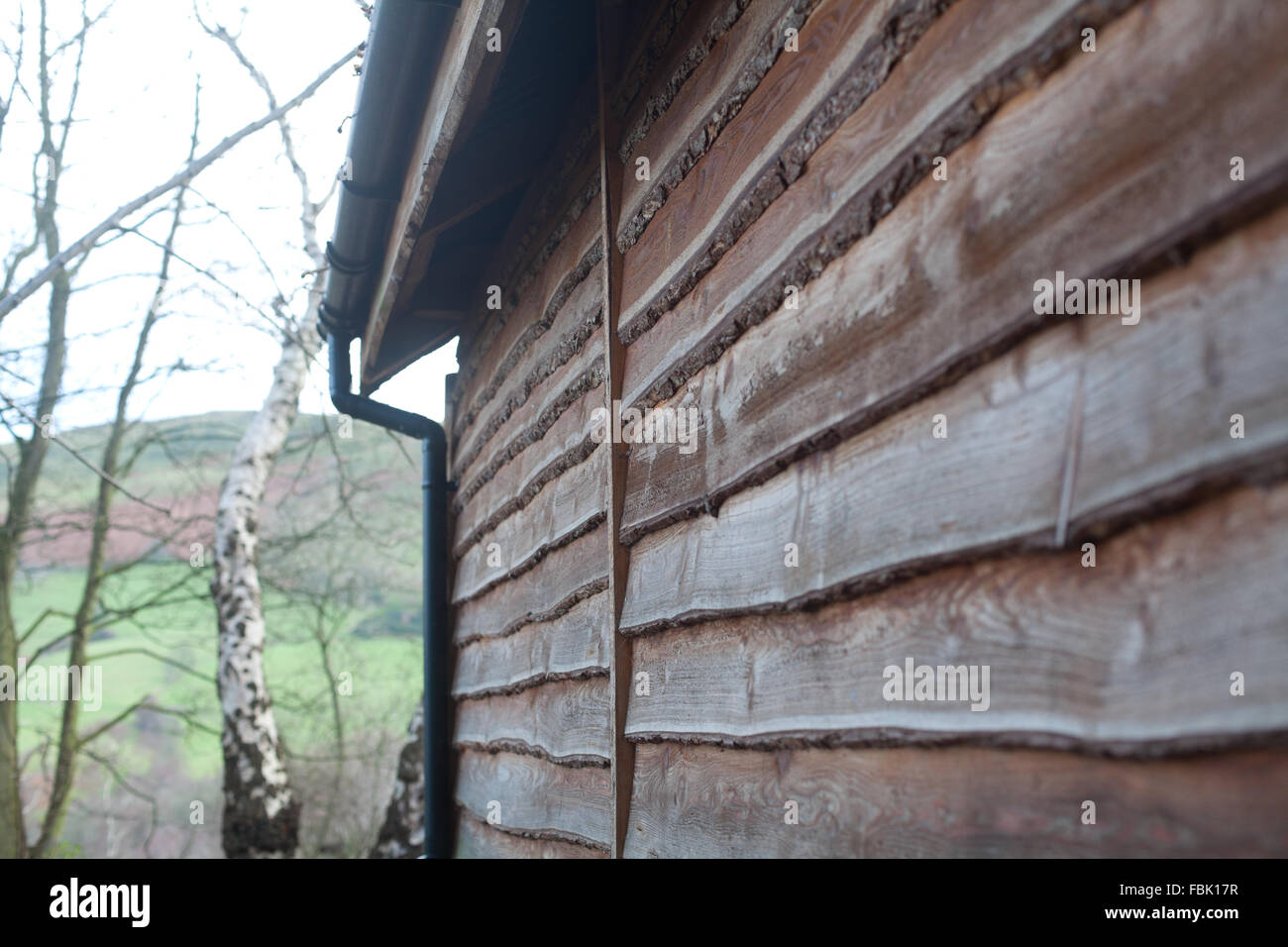Side view of wood lap cladding on a traditional oak frame building in ...