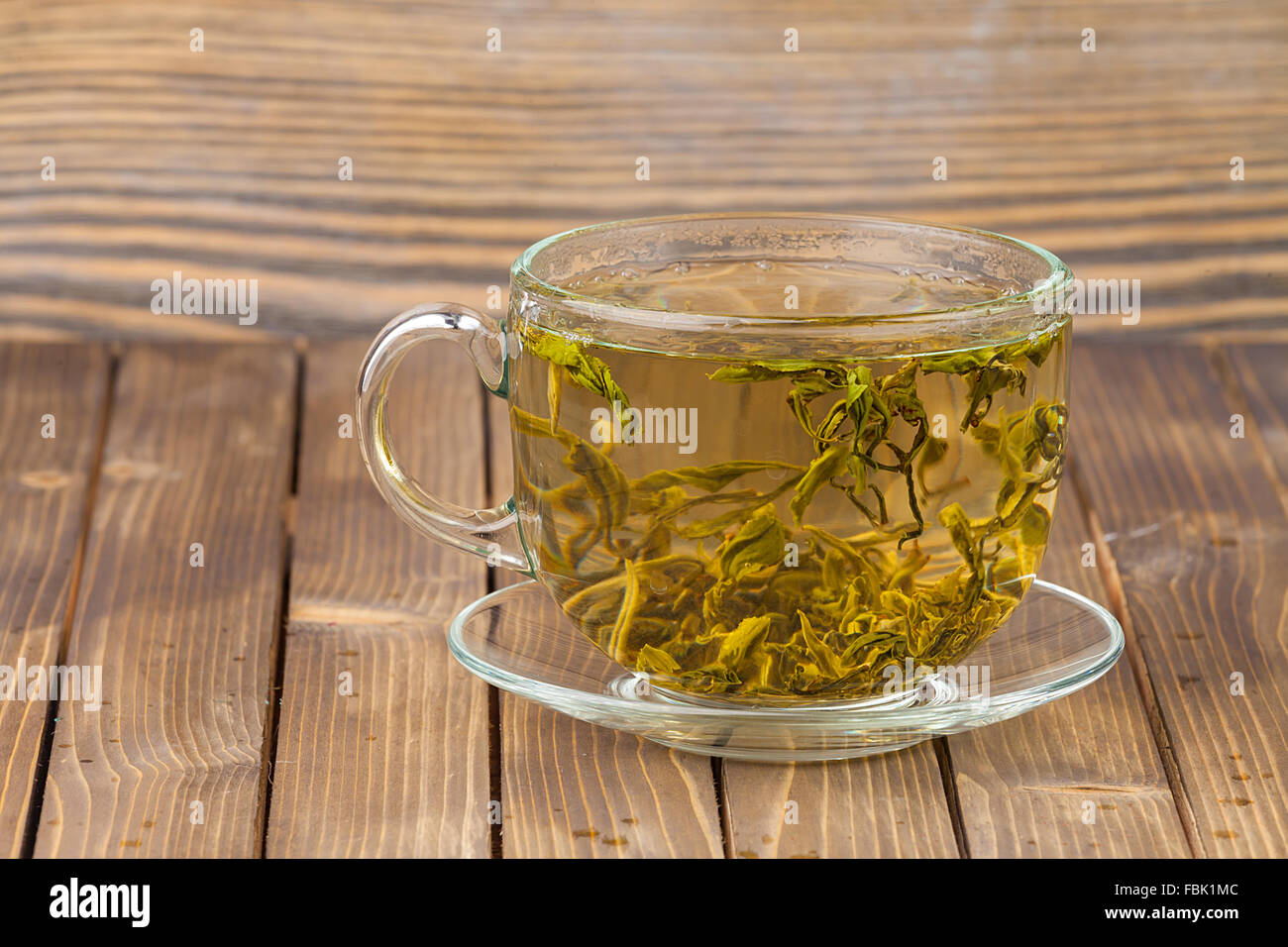 Cup with green tea Stock Photo - Alamy