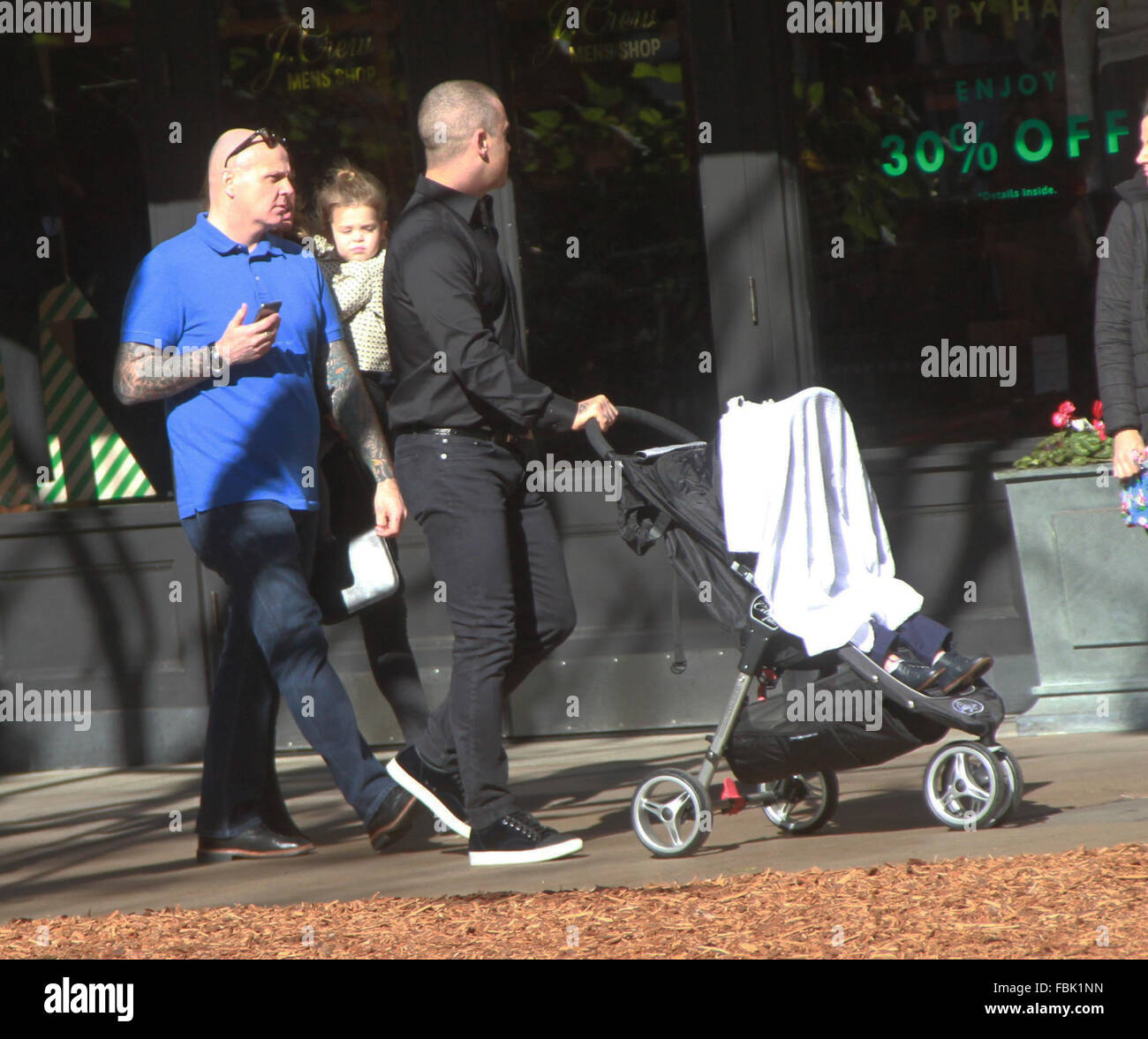 Robbie Williams takes his family shopping at The Grove in Hollywood ...