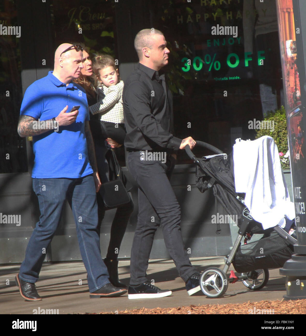 Robbie Williams takes his family shopping at The Grove in Hollywood ...
