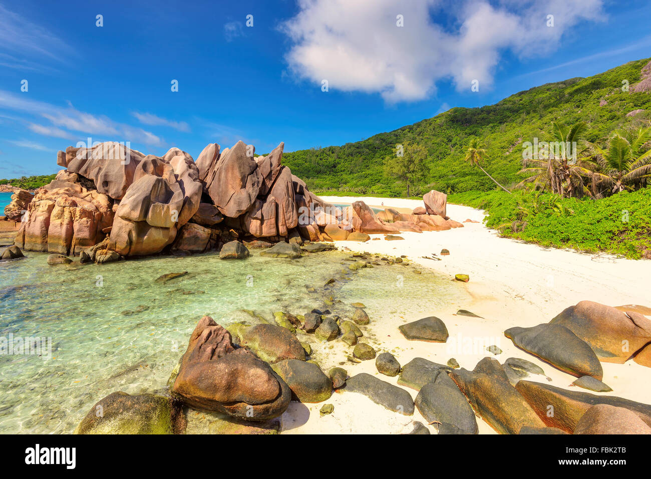 Rocks on tropical beach at Seychelles Stock Photo - Alamy