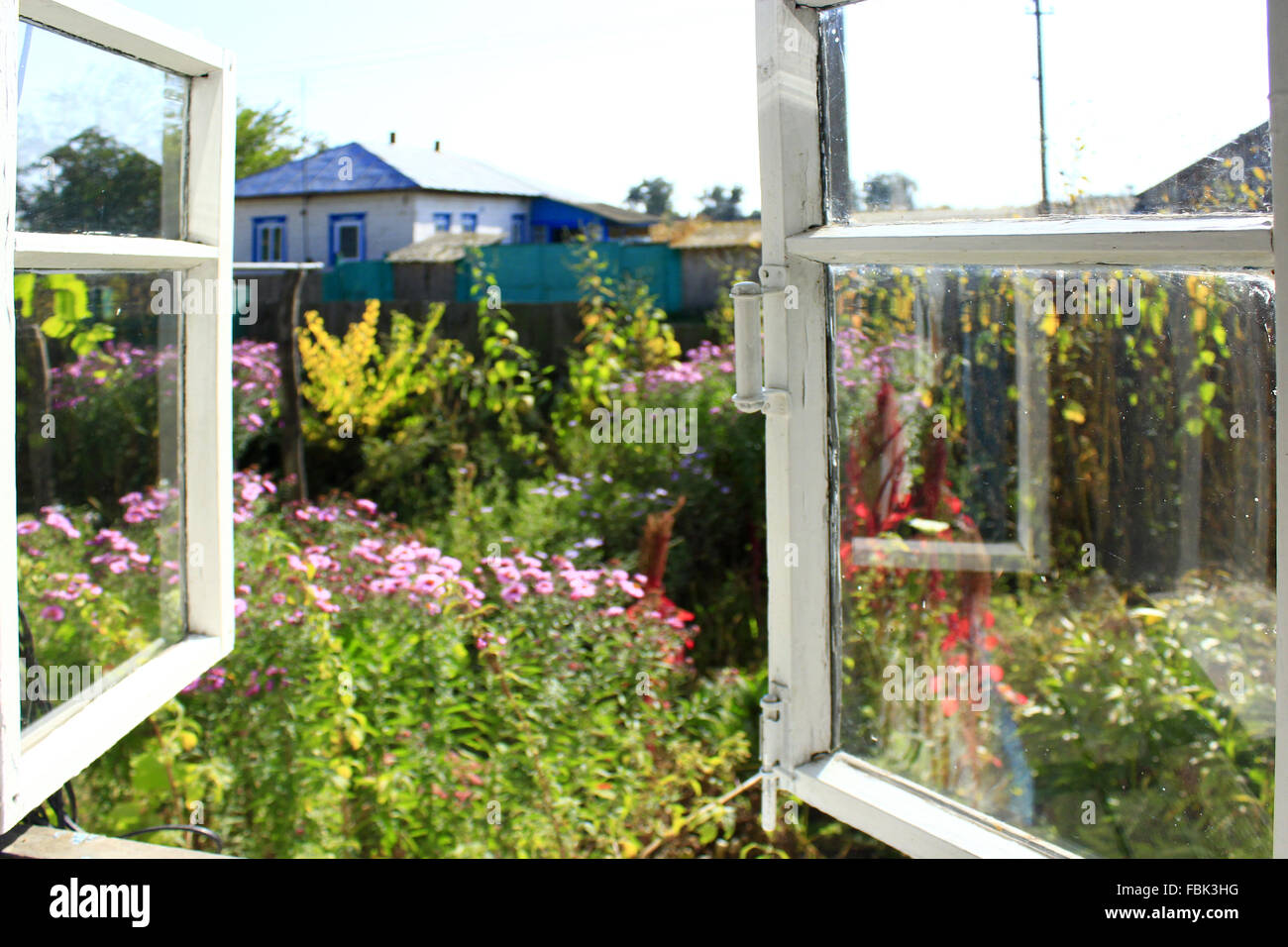 opened window to the summer garden in the village Stock Photo - Alamy