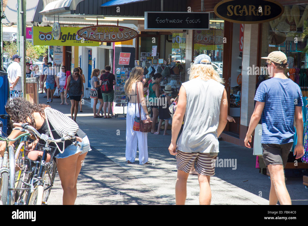 Byron Bay town centre with shops and visitors browsing and relaxing ...