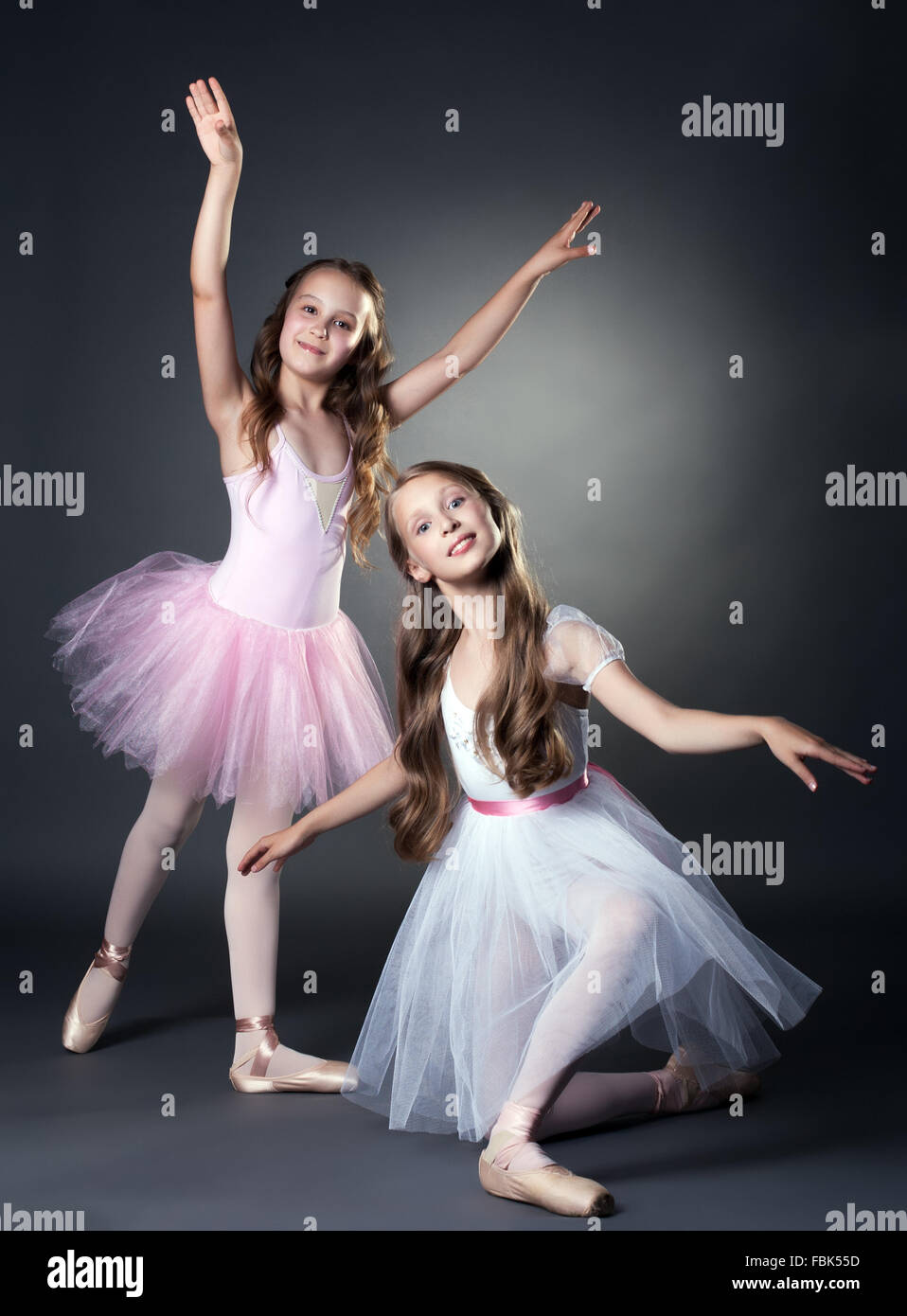 Two beautiful young ballerinas posing hi-res stock photography and ...