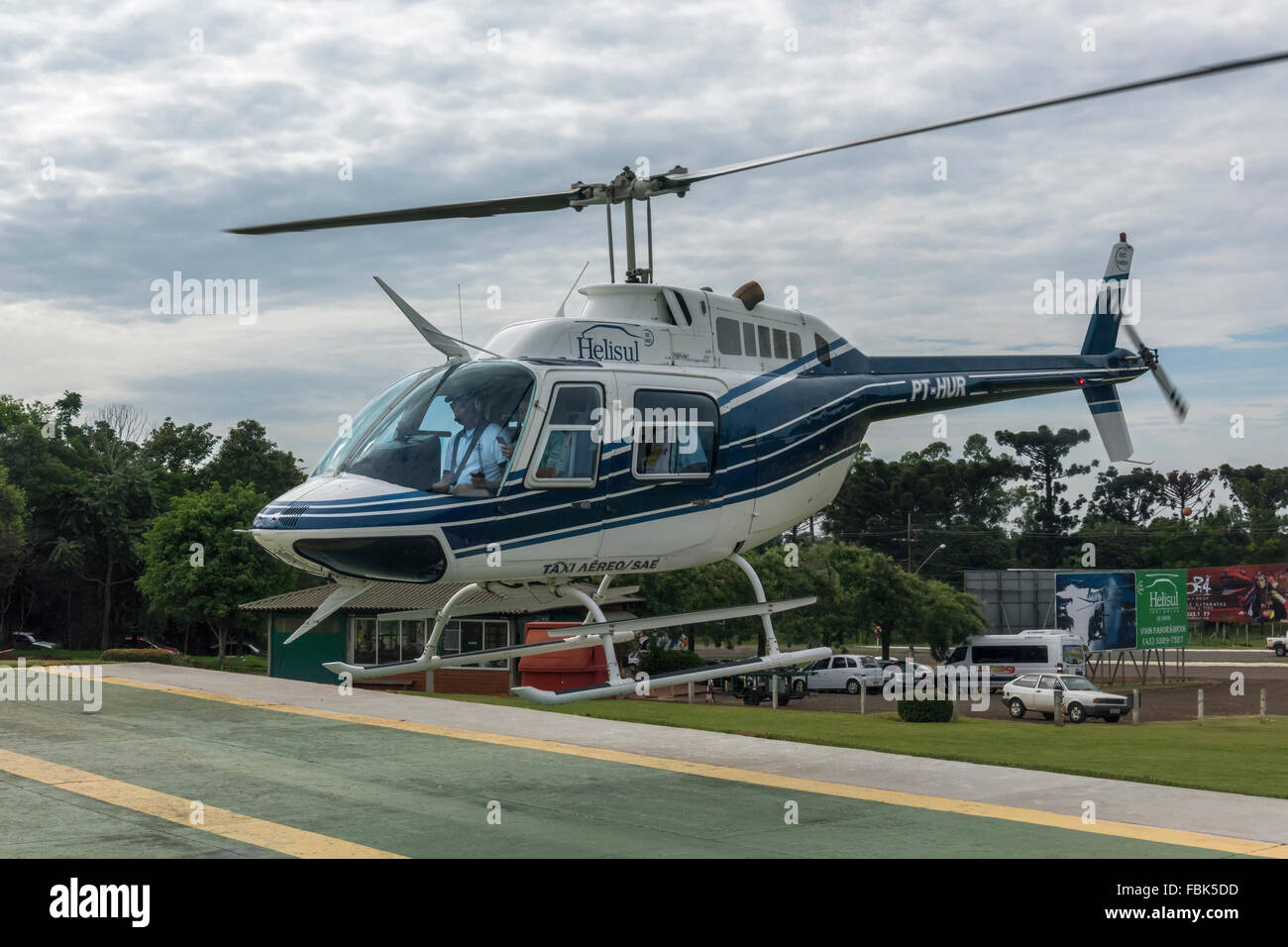 Taking off in a Helisul helicopter to photograph the falls, Foz do ...