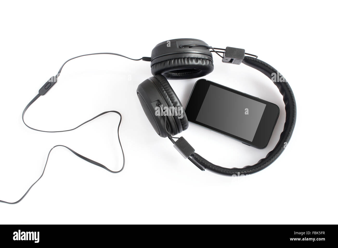 Headphones and smartphone isolated on white background Stock Photo - Alamy