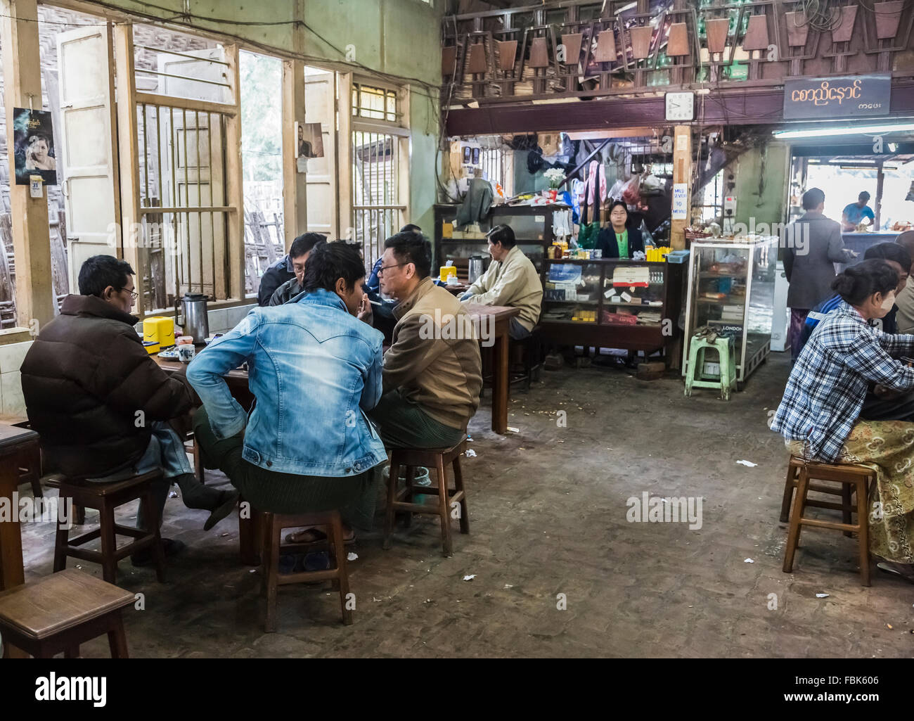 Interior of typical local tea rooms, local Burmese people eating ...