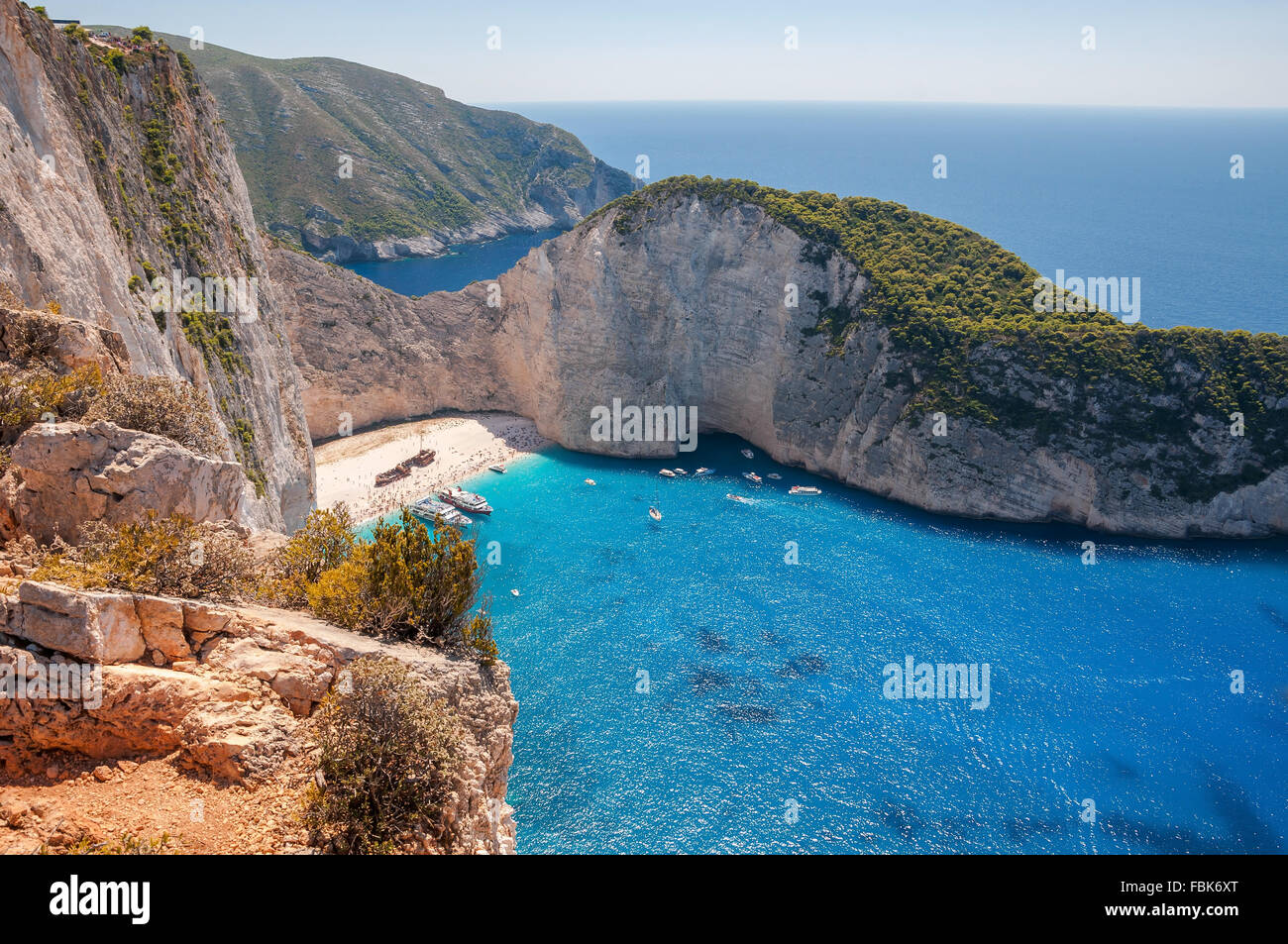 Crowded Navagio Beach on Zakynthos seen from the cliff Stock Photo - Alamy