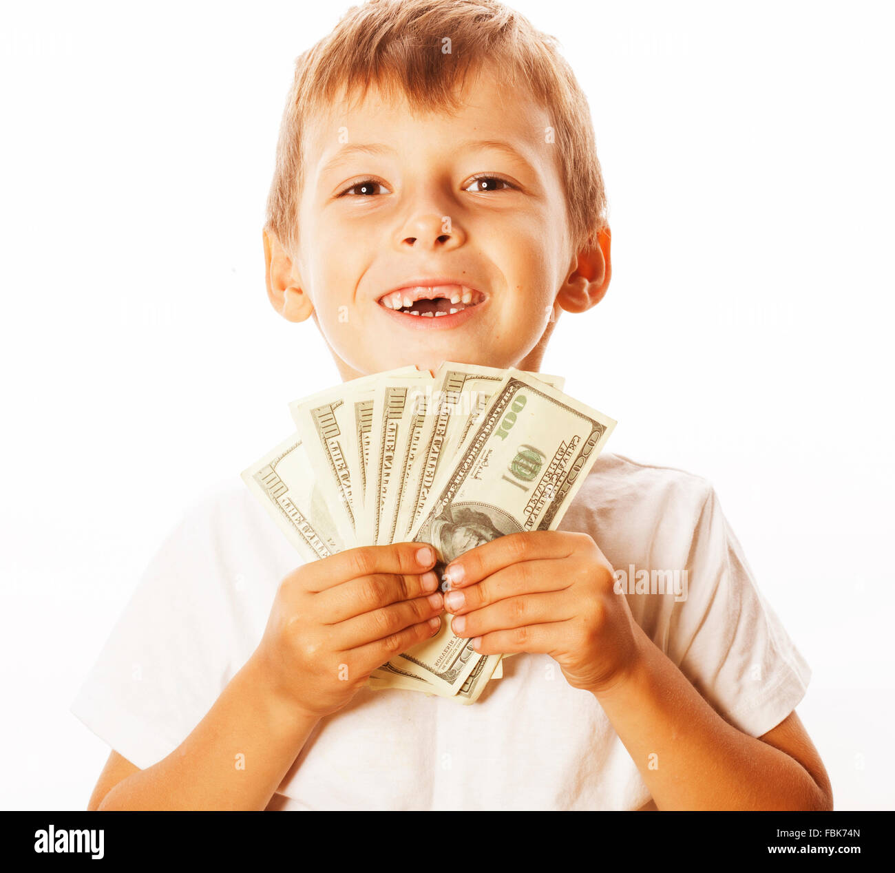 young cute boy holding lot of cash, american dollars isolated teeth ...