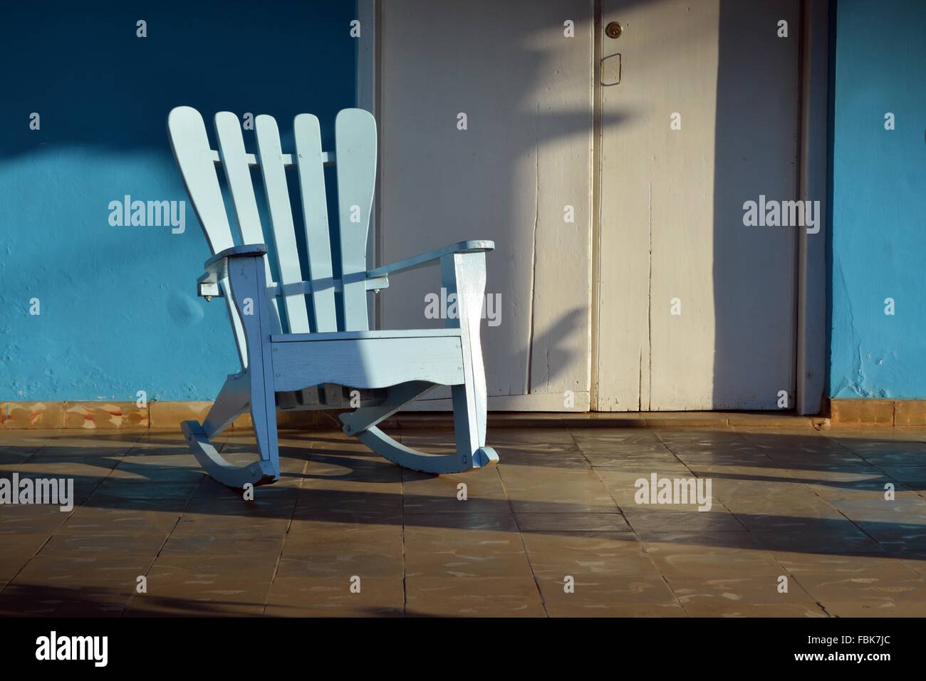 empty wooden rocking chair on a sunny porch in Vinales Pinar Del Rio ...