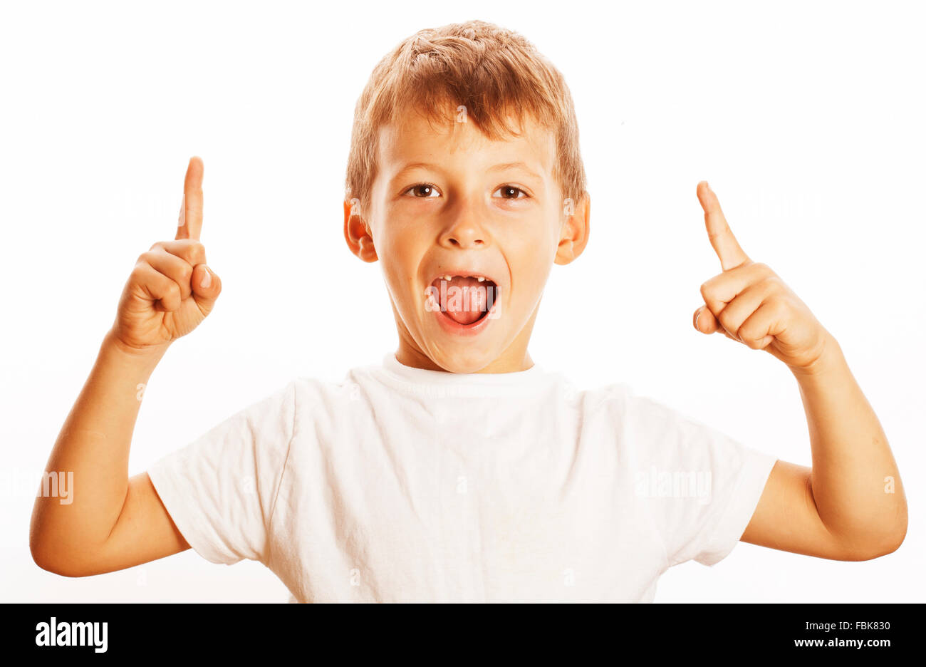 little cute white boy pointing in studio isolated close up Stock Photo ...
