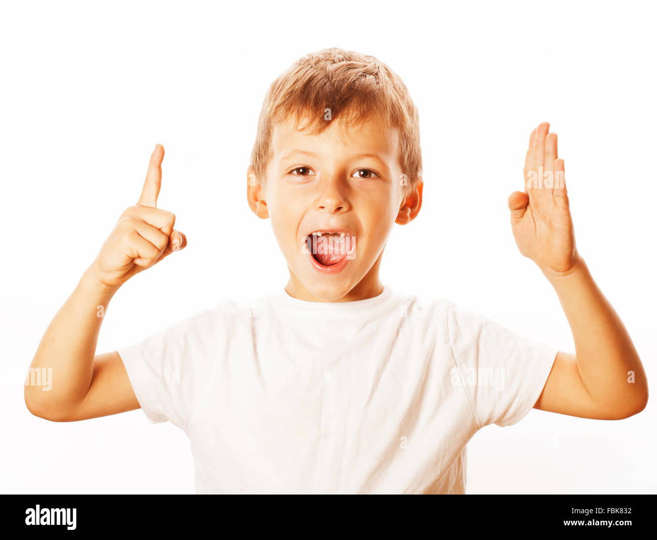 little cute white boy pointing in studio isolated close up Stock Photo ...