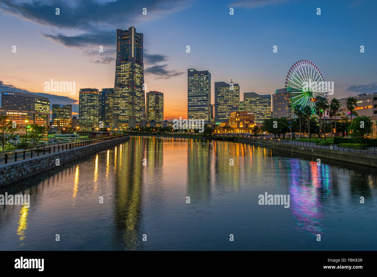 The reflection of Yokohama Landmark Tower and the surrounding modern ...