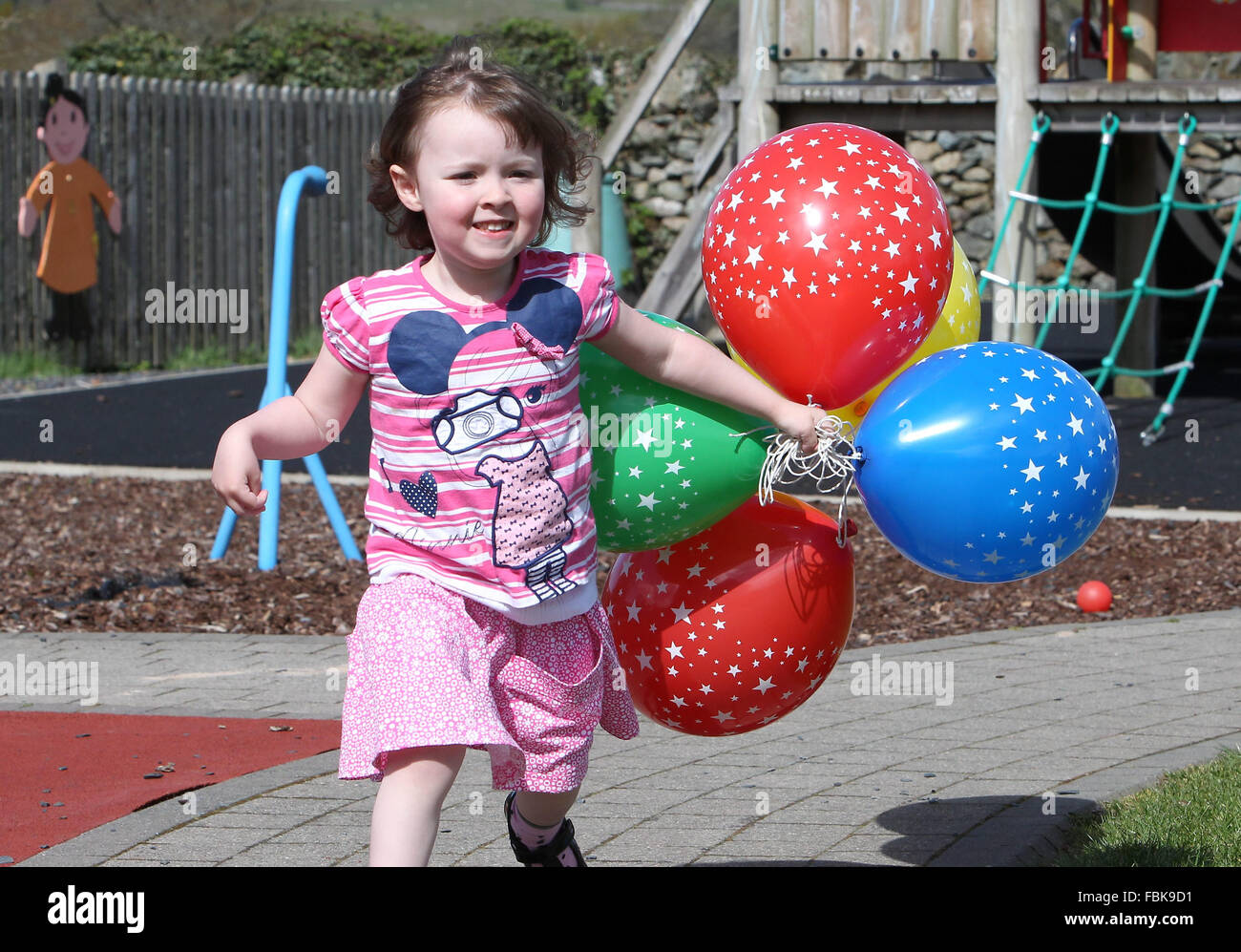 Children playing with balloons at a nursery Stock Photo - Alamy