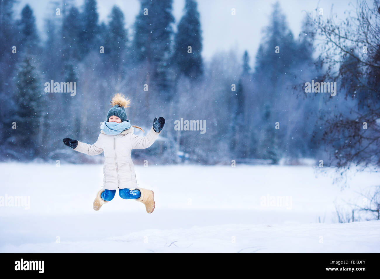 Adorable little girl in frozen winter day outdoors Stock Photo - Alamy