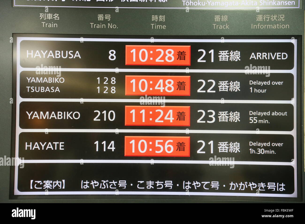A Tokyo Station signboard shows train delays due to snow as on January ...