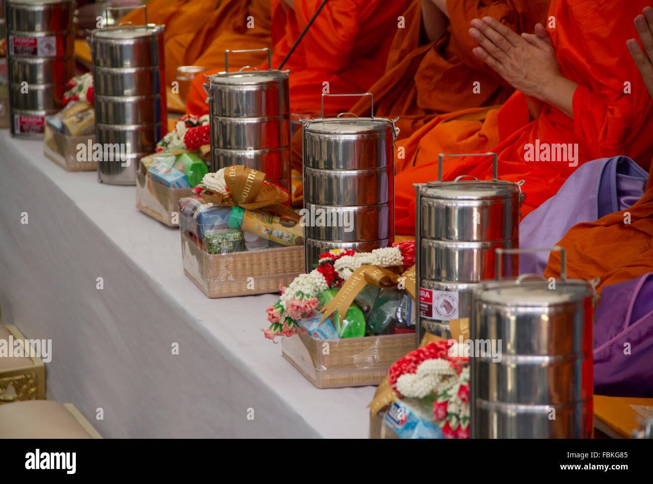 Gifts for monks during a multi-faith, Buddhist, Islamic, Christian ...