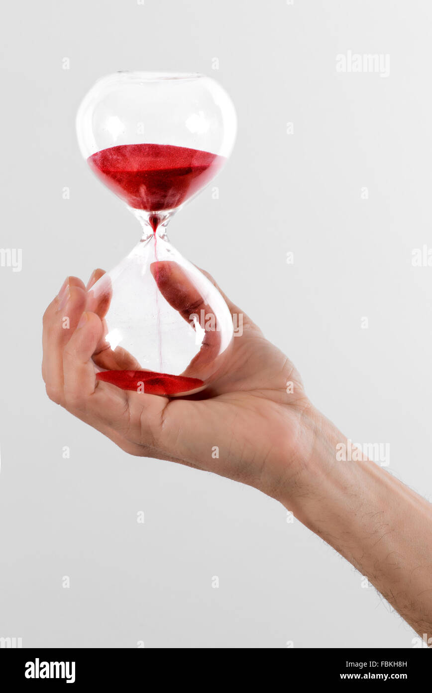 Red hourglass hi-res stock photography and images - Alamy