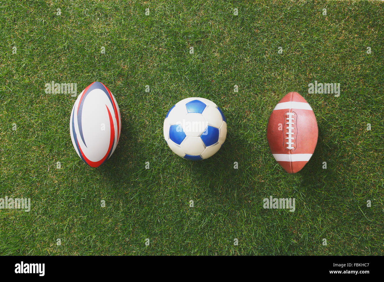 American rugby ball on grass hi-res stock photography and images - Alamy