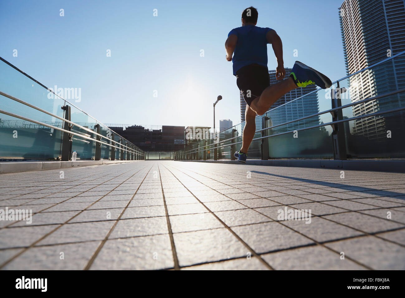 Young man silhouette running hi-res stock photography and images - Alamy