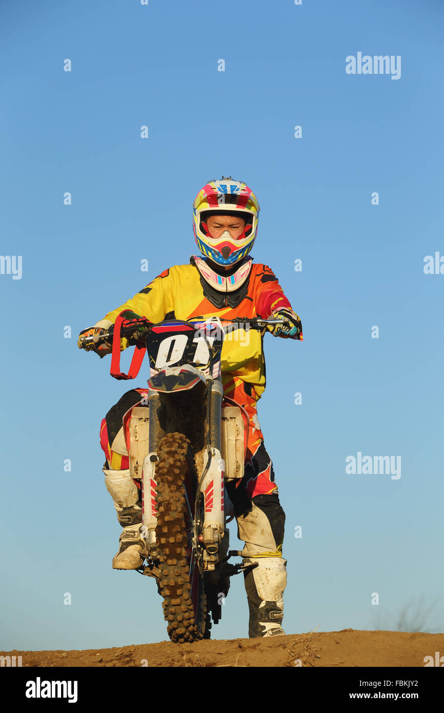 Young male motocross rider racing hi-res stock photography and images ...