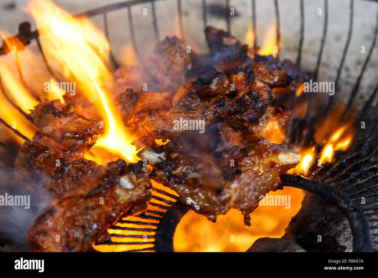pork meat roasting on fire closeup Stock Photo - Alamy