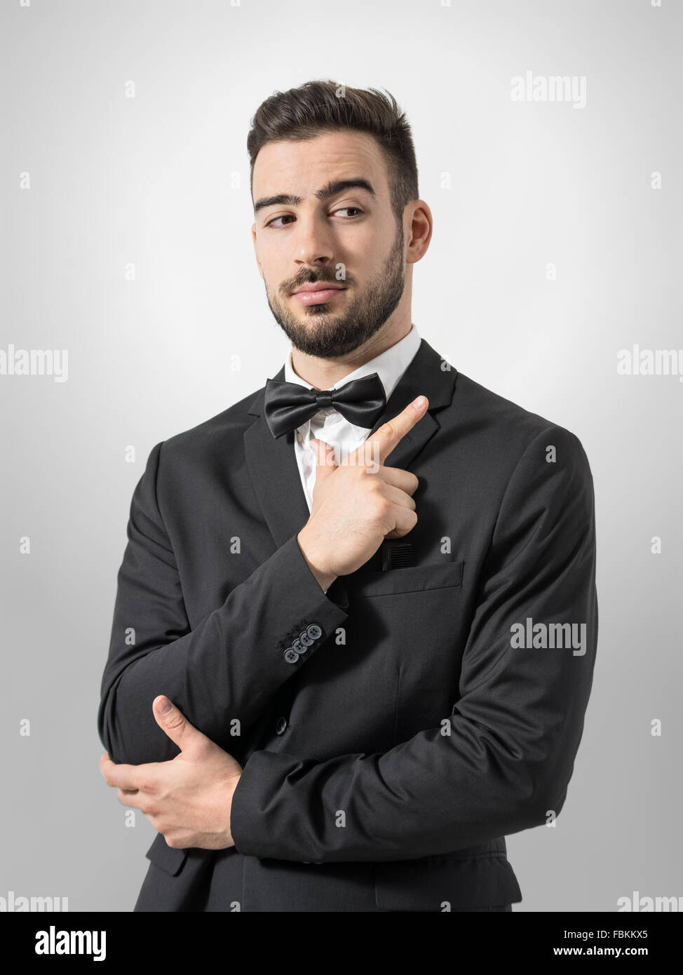 Secret service agent or bodyguard mimic pistol with hand gun gesture ...