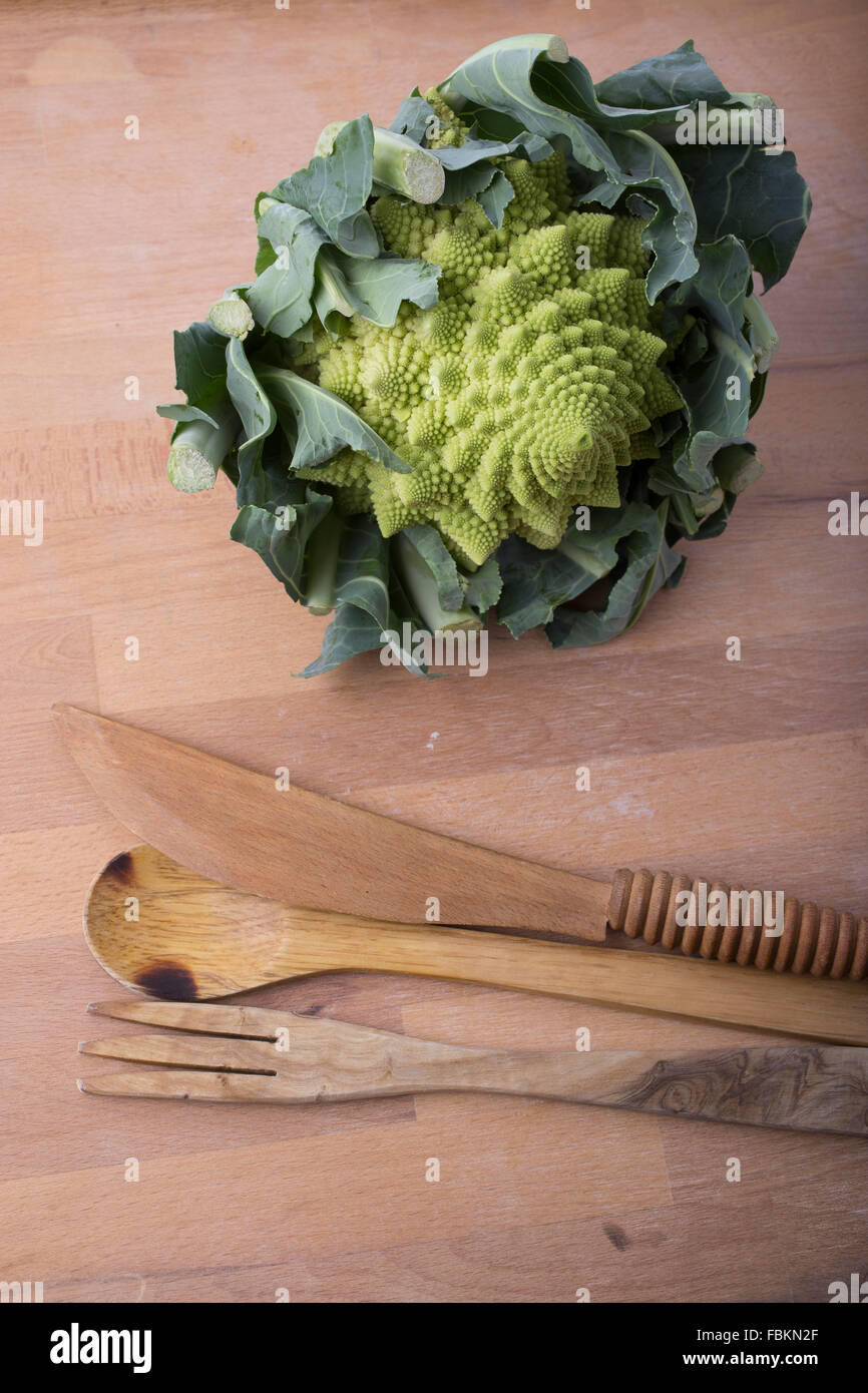 cabbage and wooden fork and spoon Stock Photo - Alamy