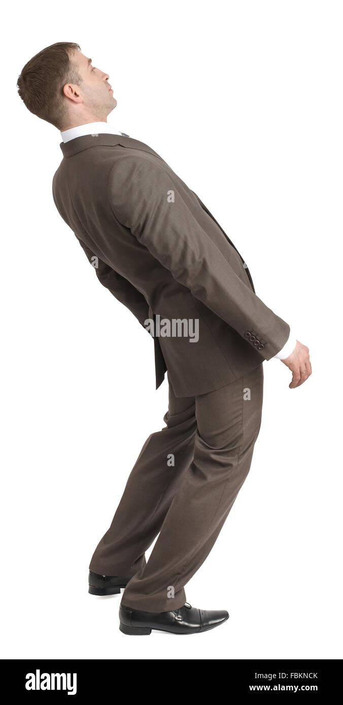 Businessman bending back Stock Photo - Alamy
