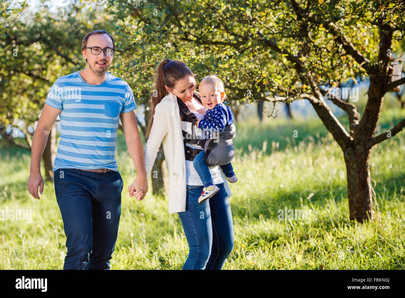 Happy family in nature Stock Photo - Alamy
