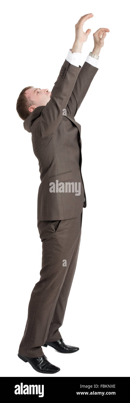Businessman with hands up Stock Photo - Alamy