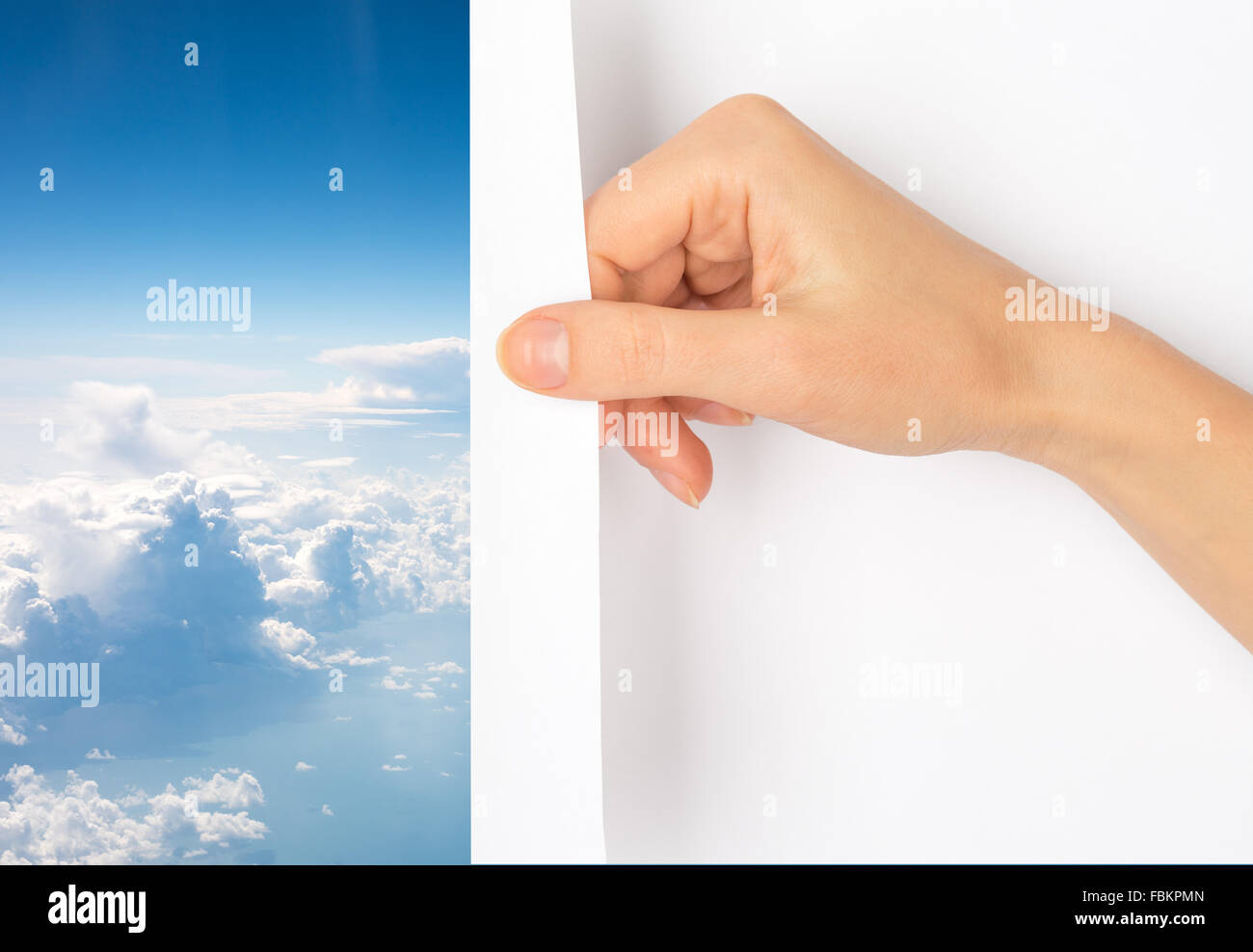 Hand turning page Stock Photo - Alamy