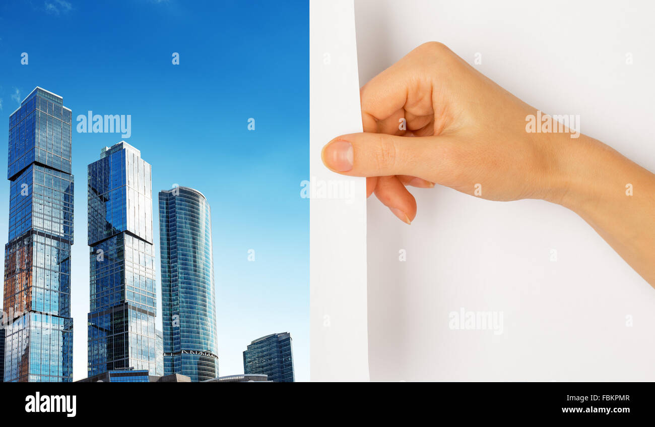 Hand turning page Stock Photo - Alamy