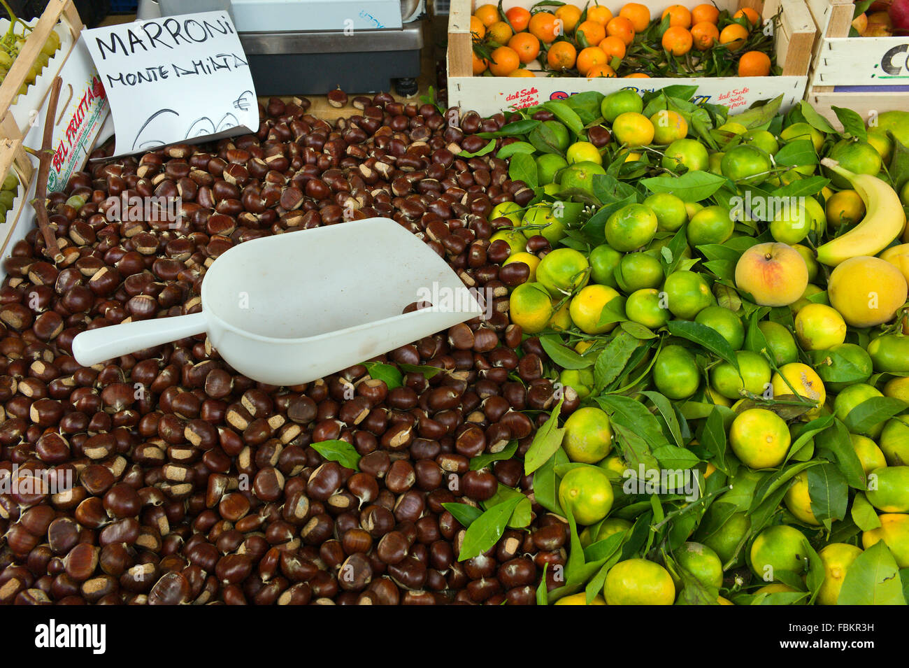 A stall selling chestnuts and clementines at the weekly fruit and ...