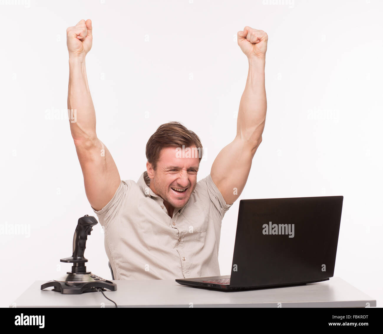 Handsome man playing computer games Stock Photo - Alamy