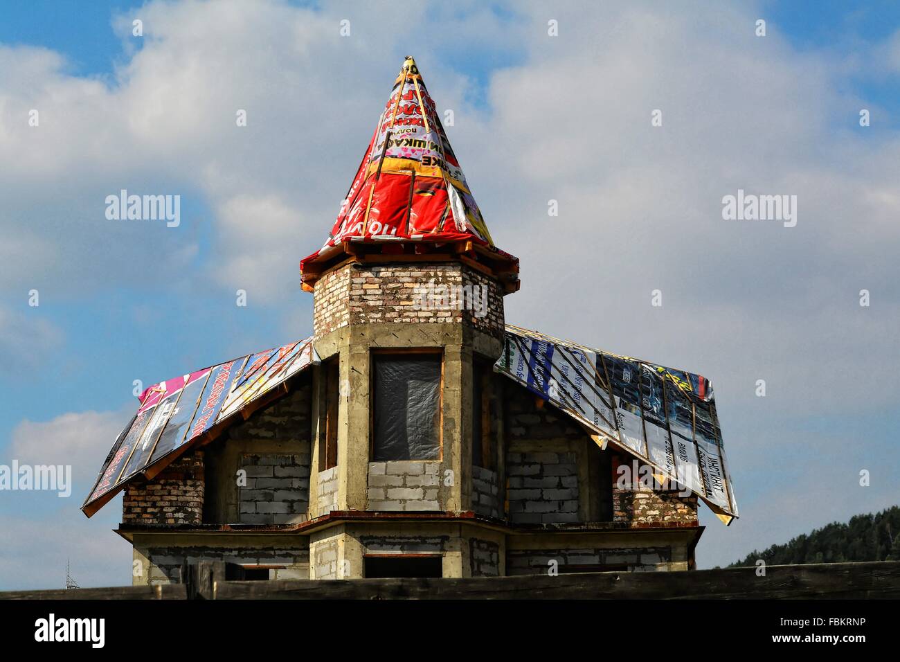 Traditional home in Listvyanka, Siberia with roof made from signs Stock ...