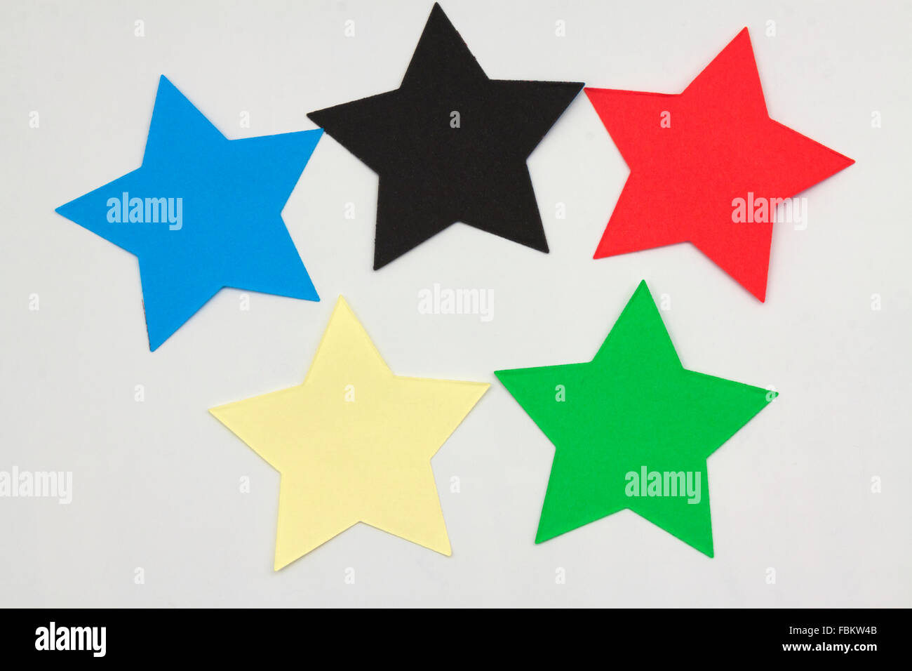 a horizontal overhead view of five paper stars with the color of the ...