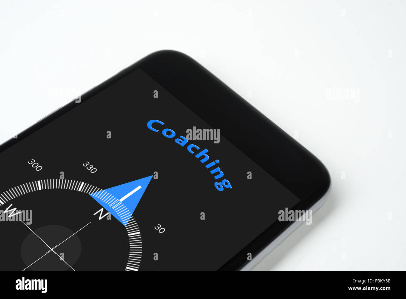 handy compass with text and arrow coaching Stock Photo - Alamy