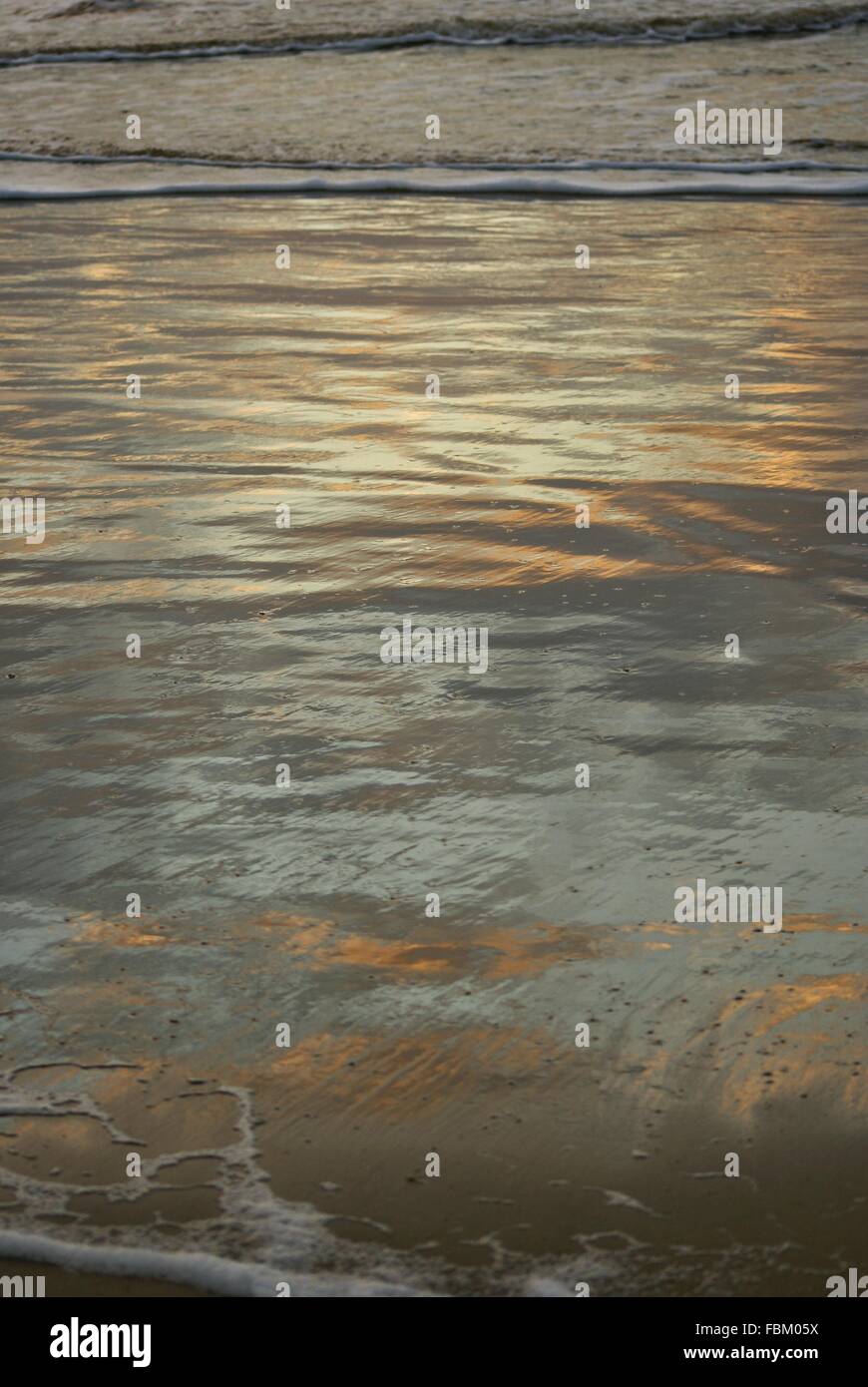 Wet sand on beach sand hi-res stock photography and images - Alamy