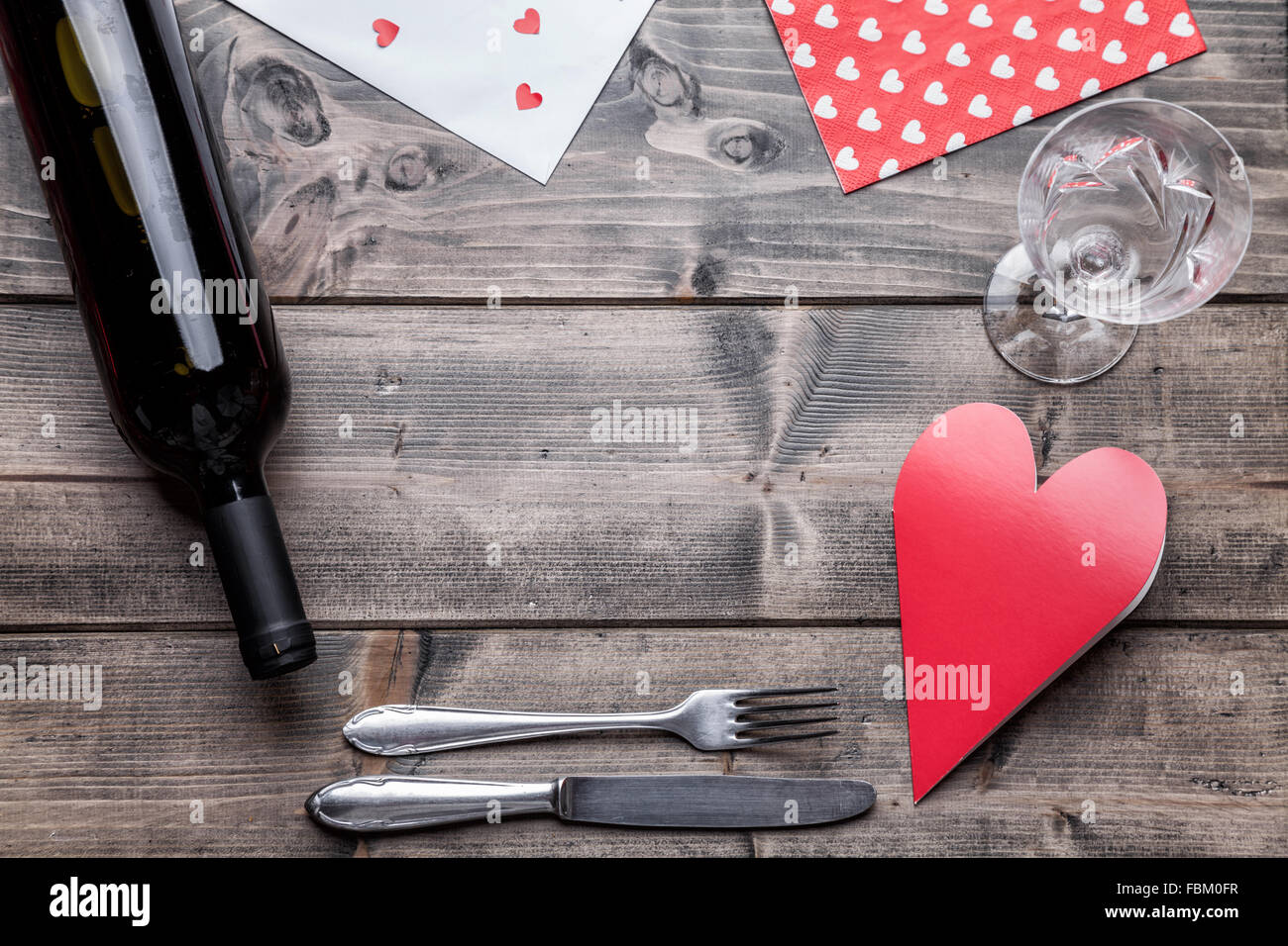 Romantic dinner set on rustic wooden background Stock Photo - Alamy