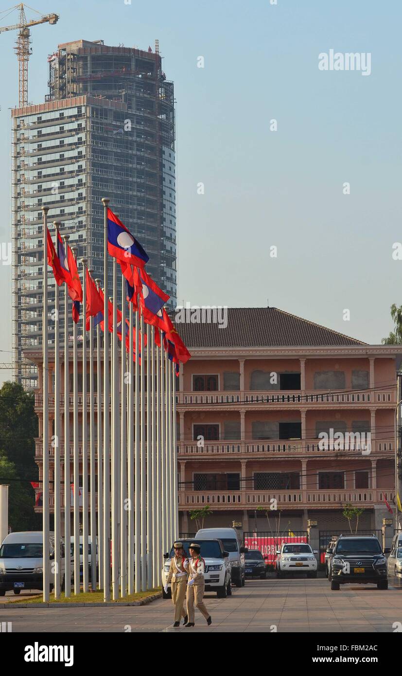Vientiane, Laos. 18th Jan, 2016. Female police walk outside the ...