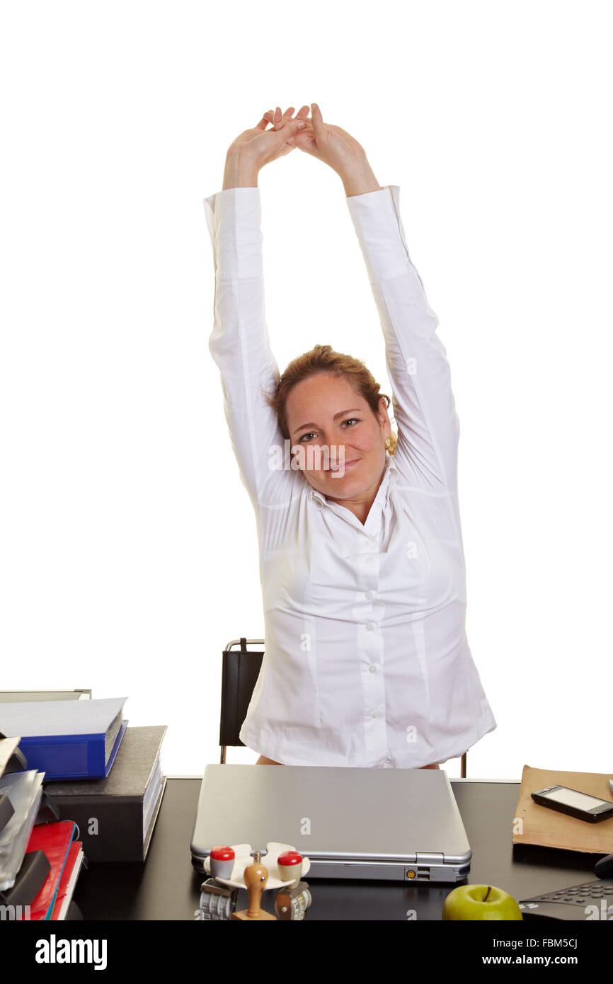 Happy business woman doing some back exercises at work Stock Photo - Alamy