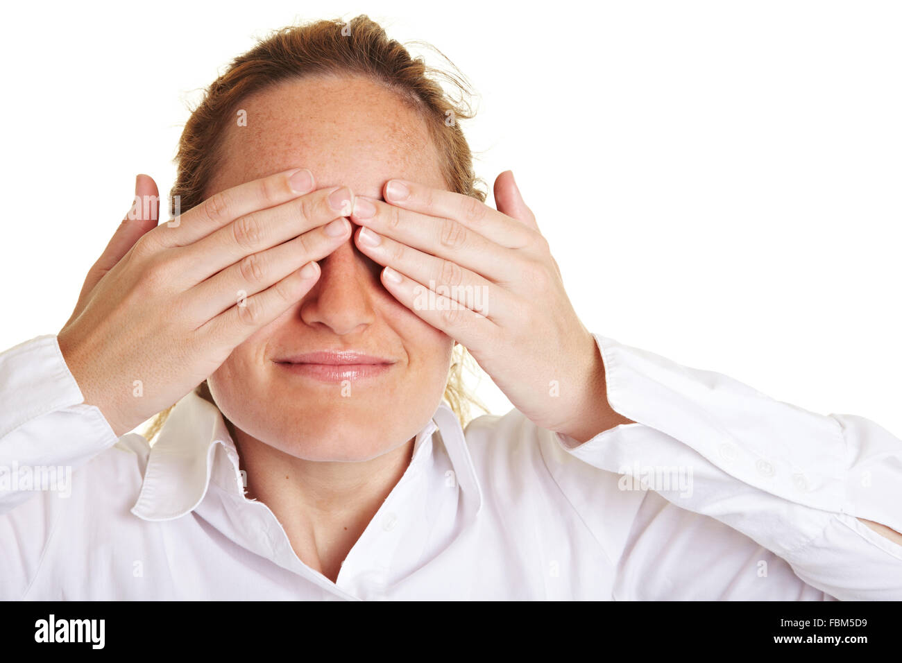 Woman covering her eyes with her both hands Stock Photo - Alamy