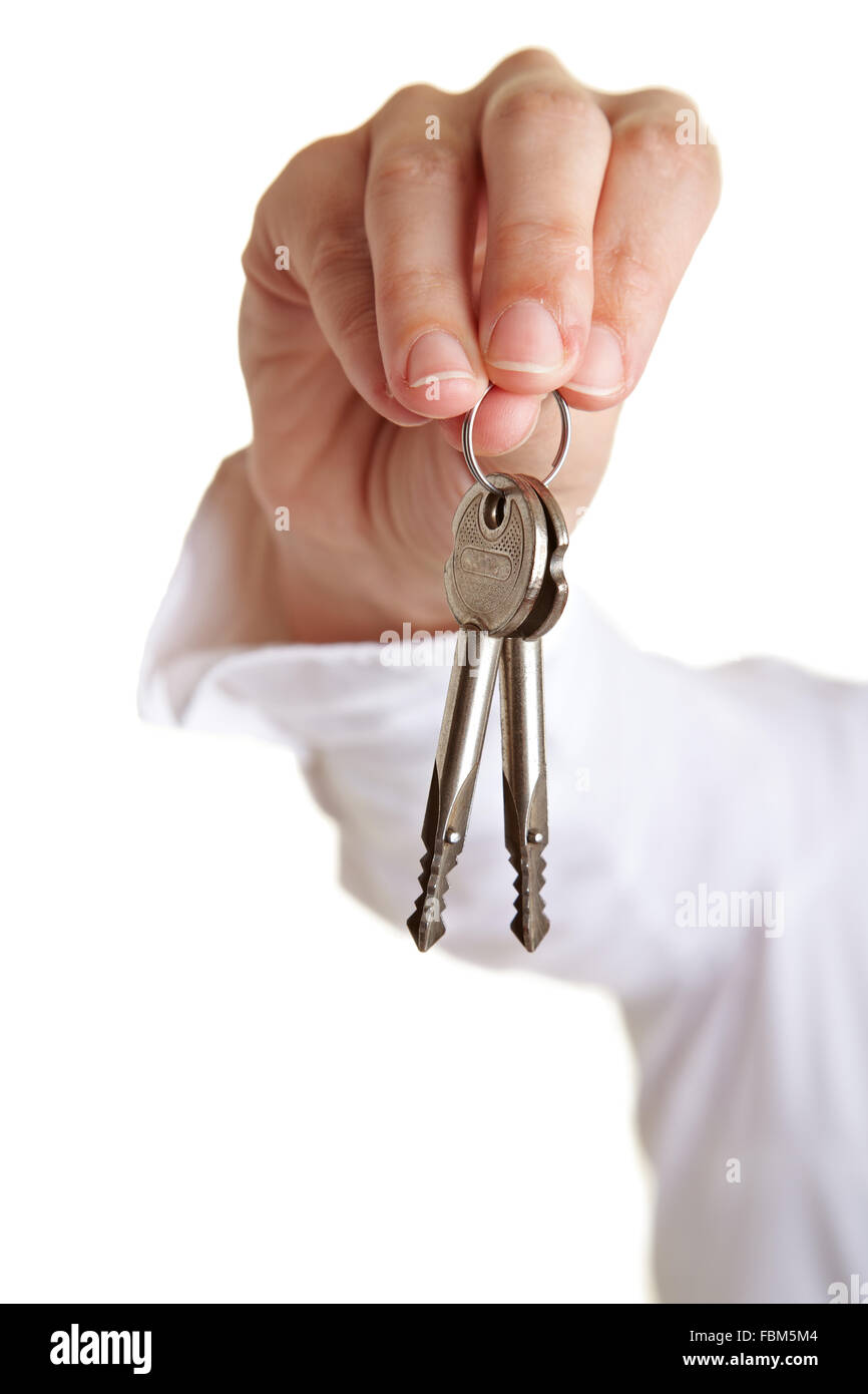 Delivery of two keys in a hand Stock Photo - Alamy