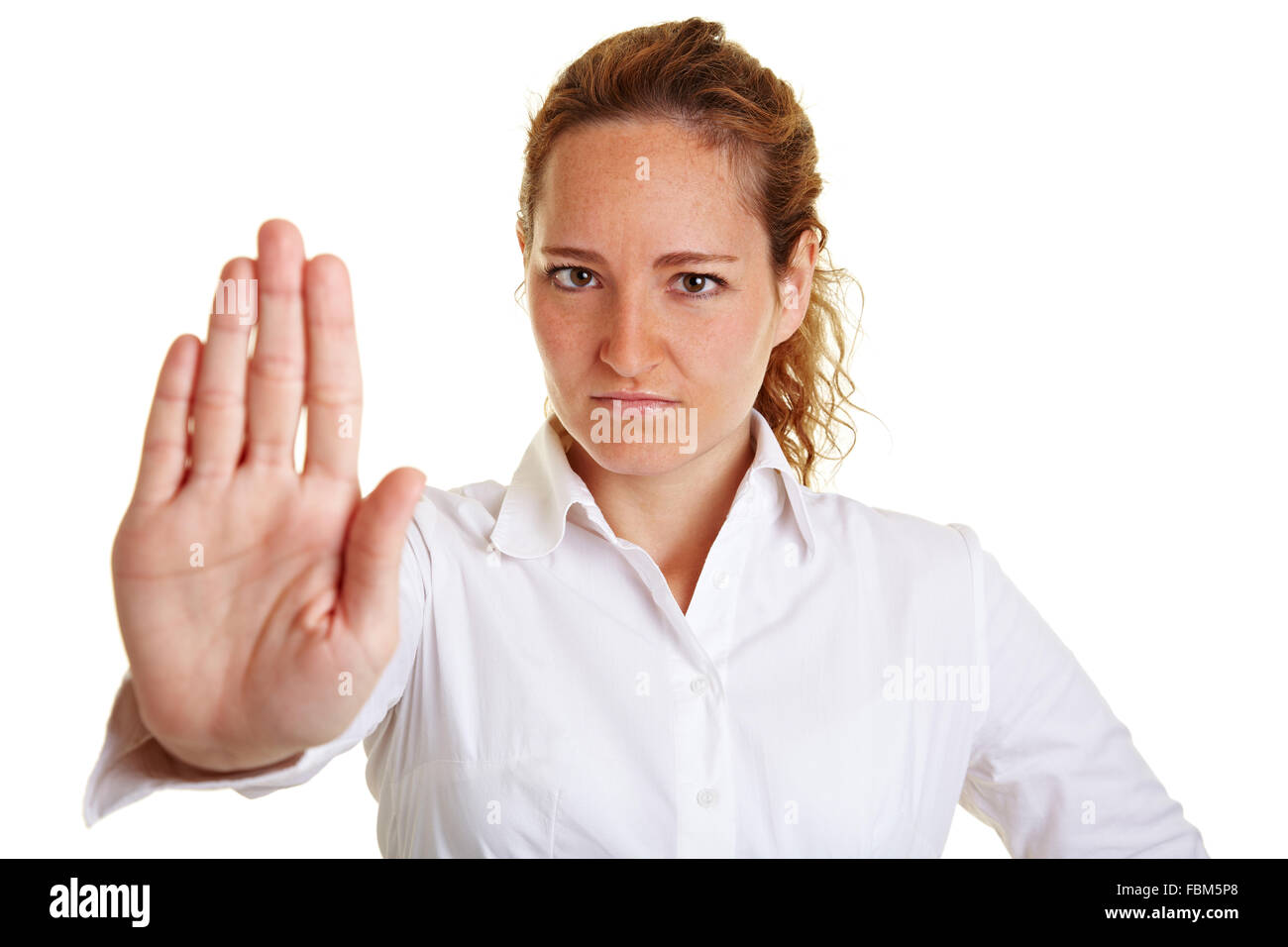 Serious business woman showing civil courage with her hand Stock Photo ...